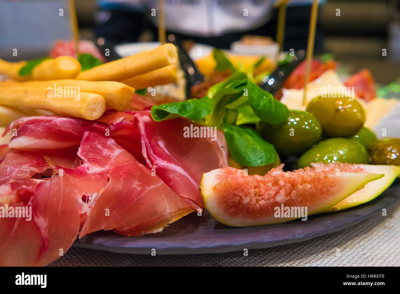 Close-up of a mixed italian appetizers plate Stock Photo - Alamy