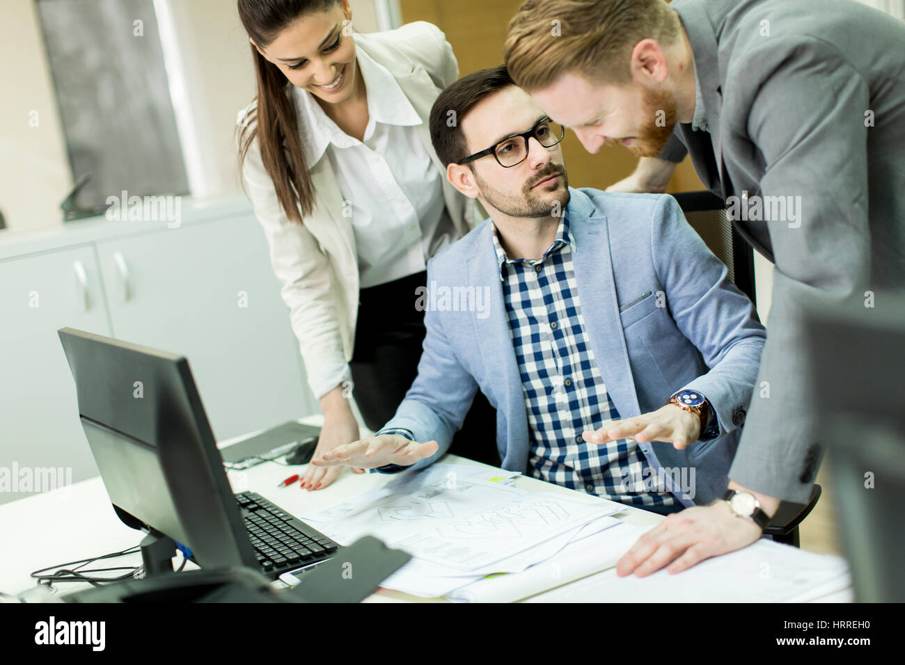 People working in a busy office. Teamwork Stock Photo - Alamy