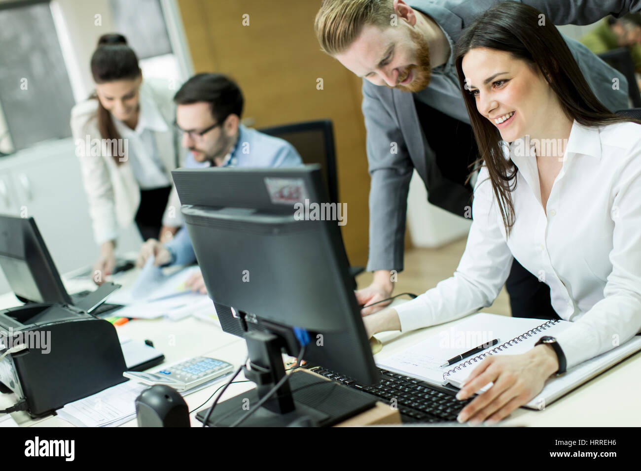 People working in a busy office. Teamwork Stock Photo - Alamy