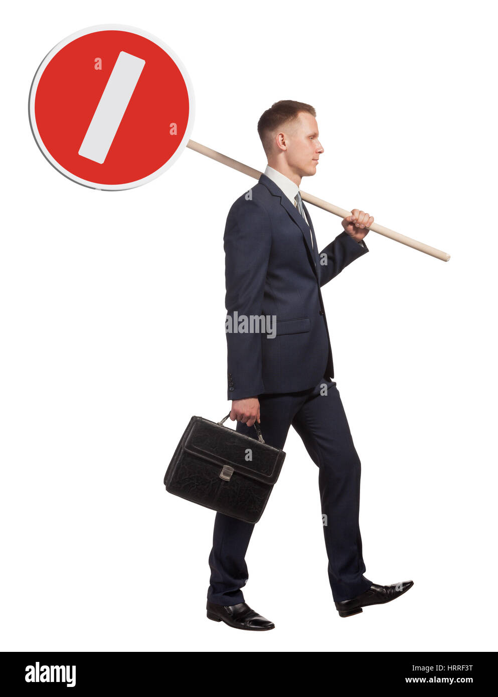 Official man carries a road sign, which means that no entry. Isolated ...