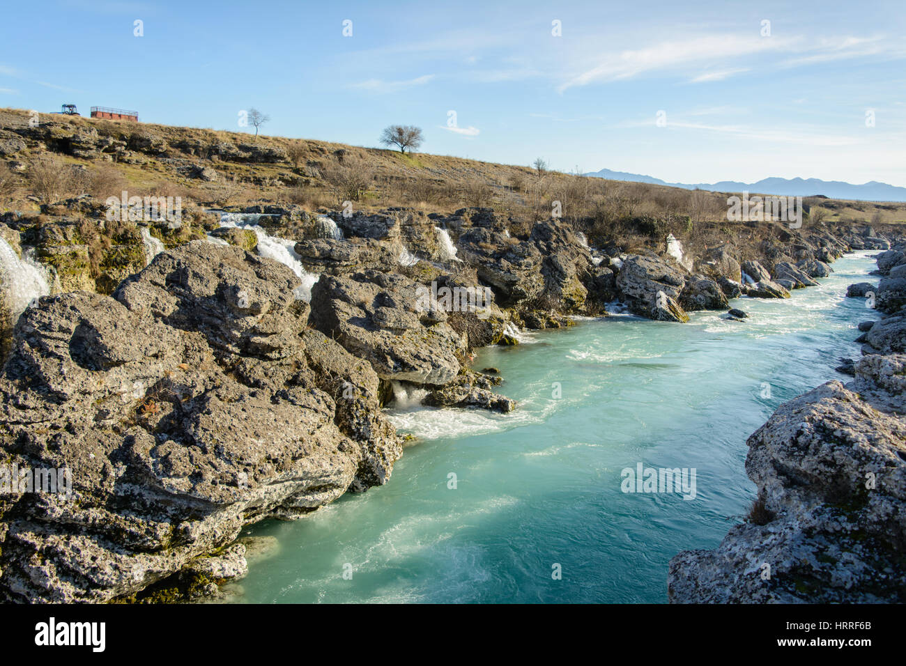 Beautiful blue river surrounded by rock formation Stock Photo - Alamy