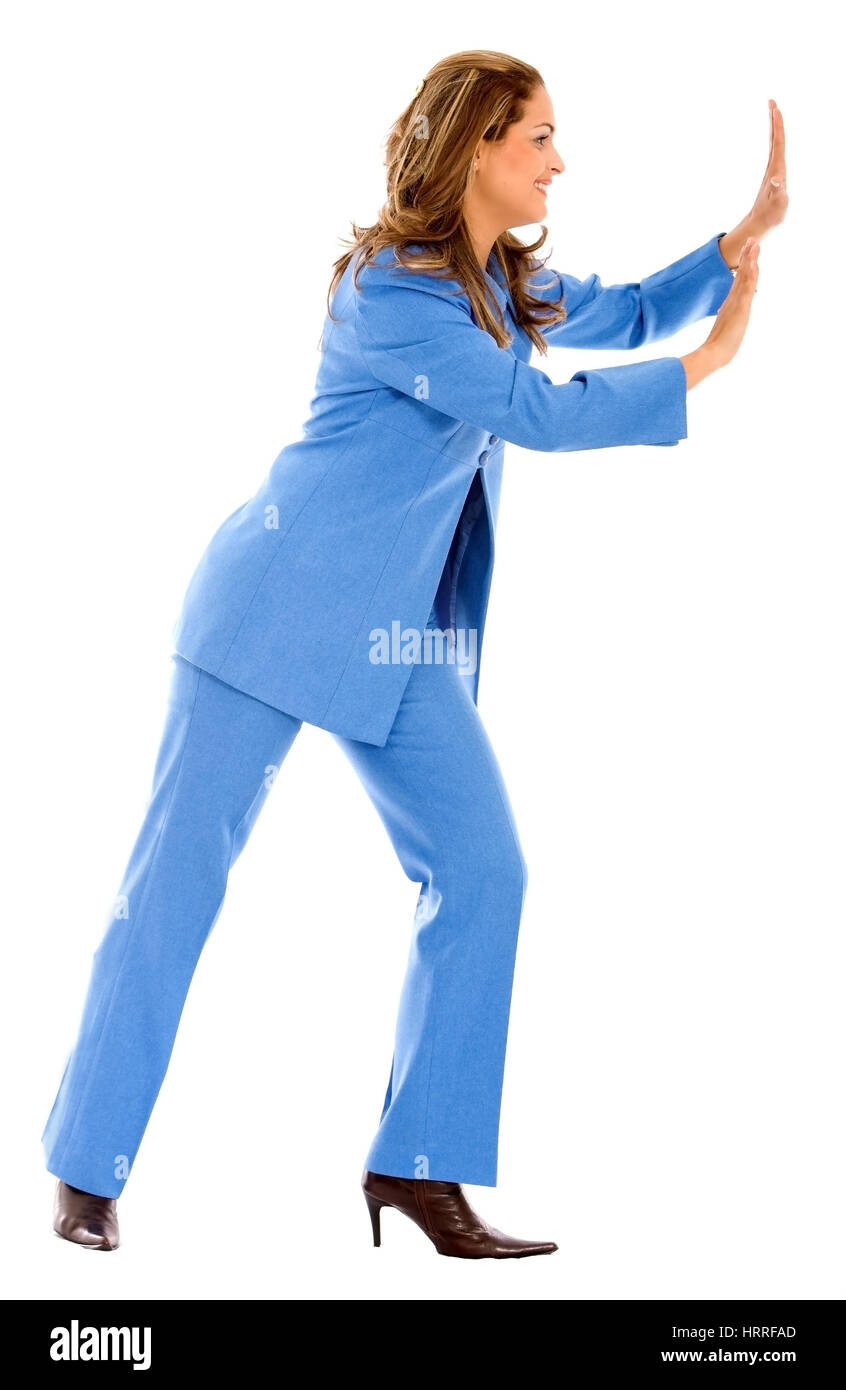 business woman pushing something isolated over a white background Stock ...
