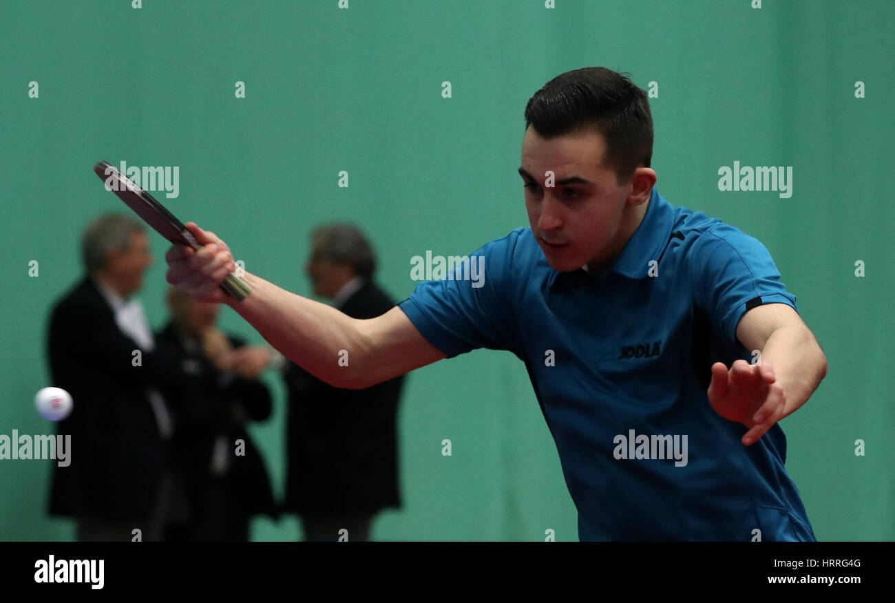Mitchell Jones in action during the Men's singles on day one of the PG ...