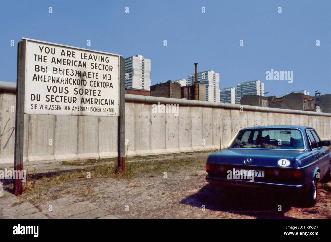the Berlin Wall near the border crossing Checkpoint Charlie, in the ...