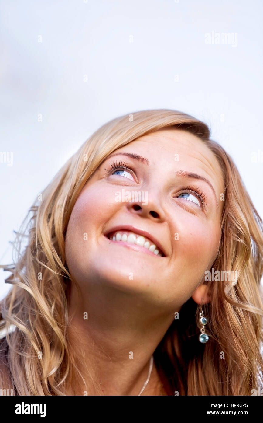 beautiful woman portrait smiling and looking up Stock Photo - Alamy