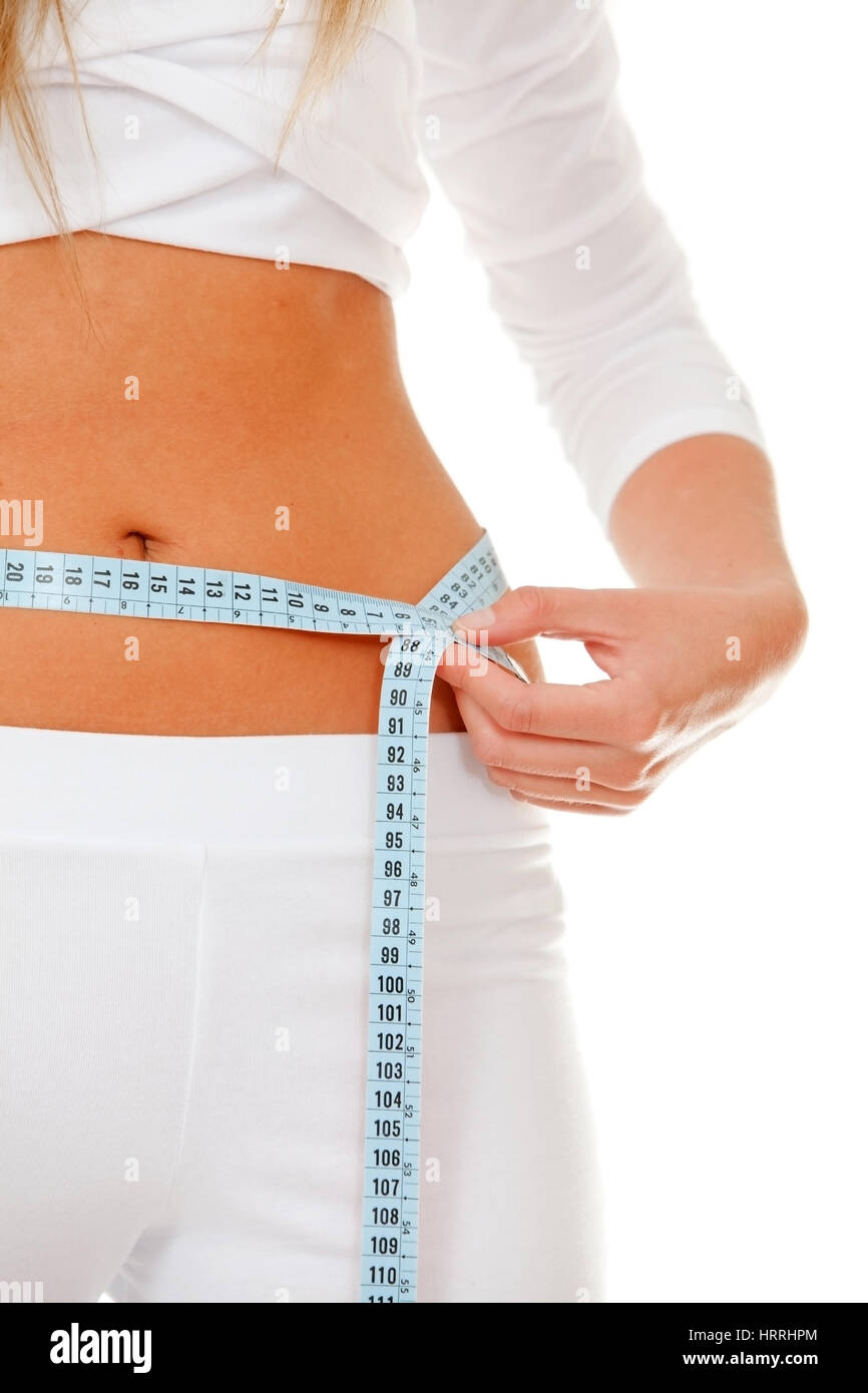fit woman measuring her waist isolated over white Stock Photo - Alamy