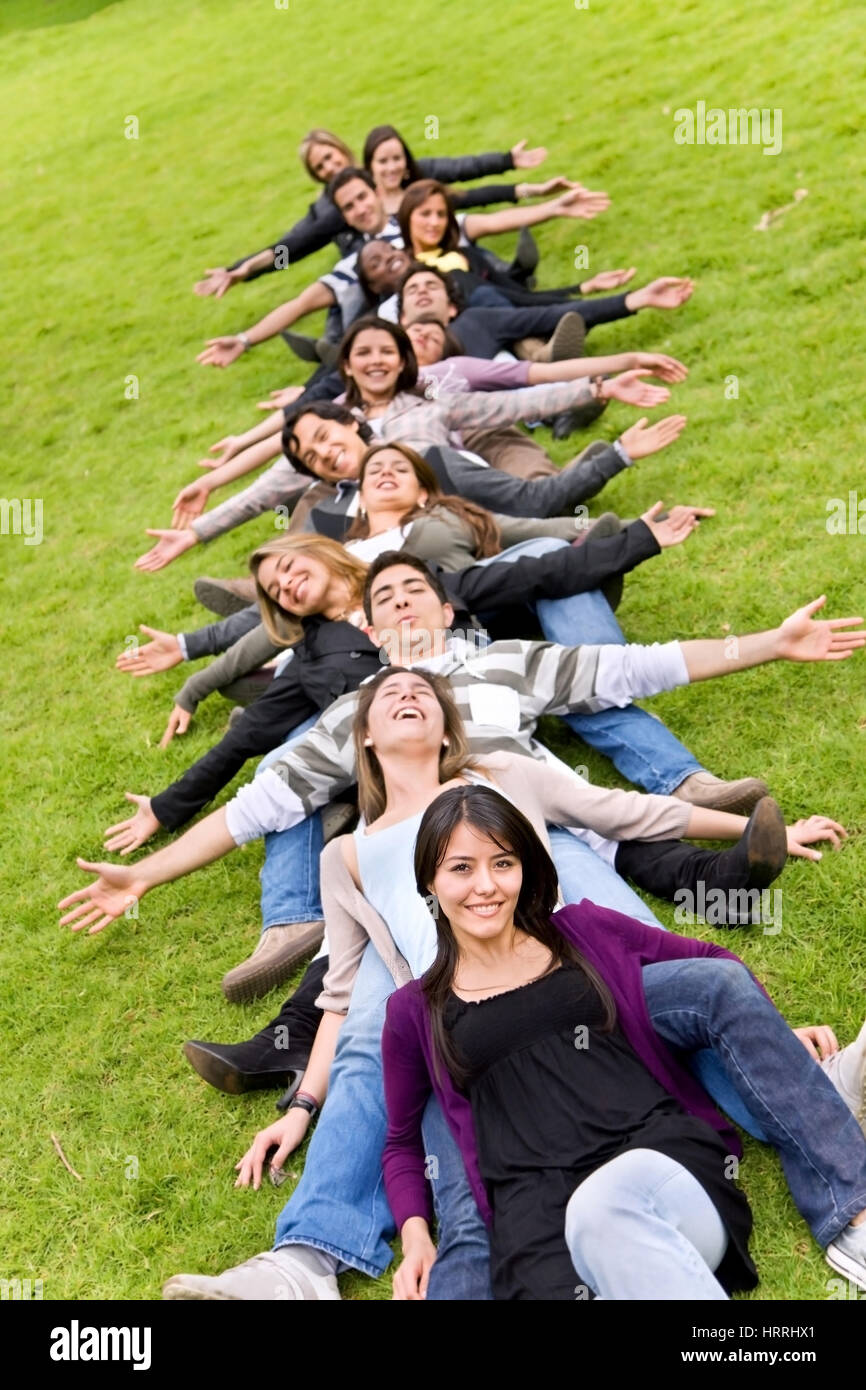 happy group of friends smiling outdoors in a park Stock Photo - Alamy