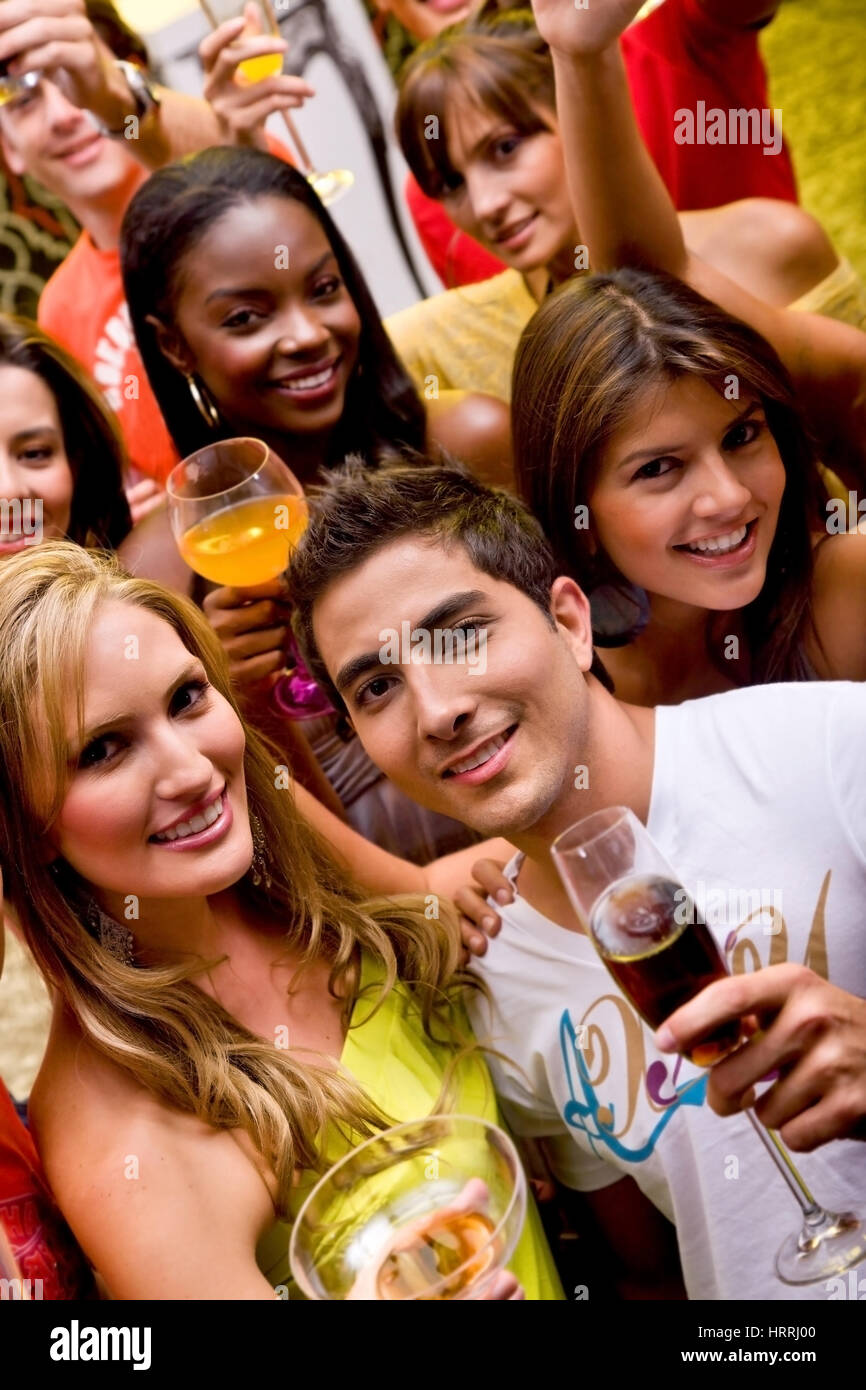 Portrait of a group of party people at a bar Stock Photo - Alamy