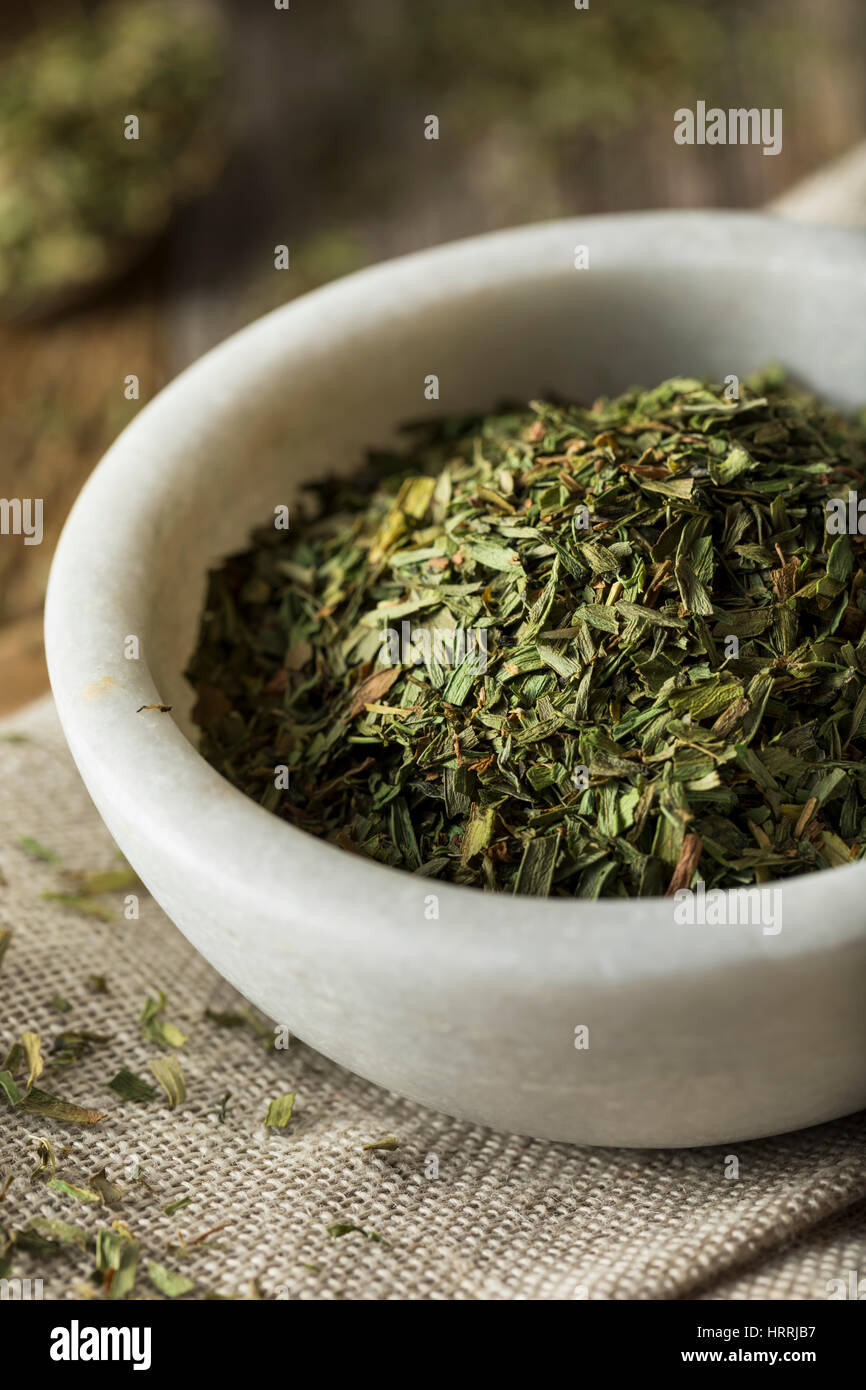 Raw Organic Dry Tarragon Spice in a Bowl Stock Photo - Alamy