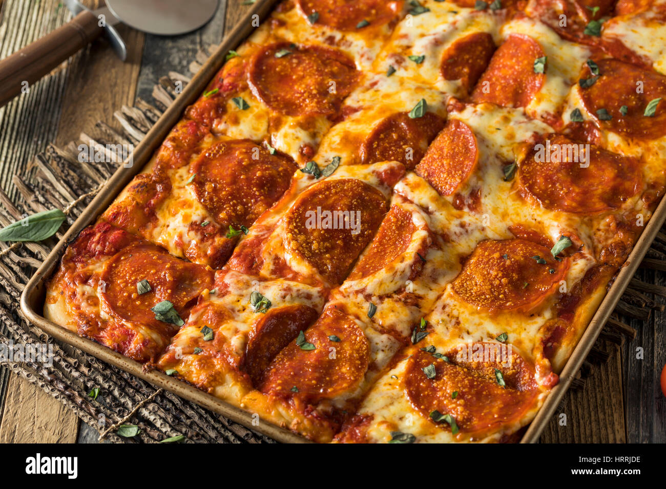 Homemade Pepperoni Sicilian Pan Pizza Ready to Eat Stock Photo - Alamy
