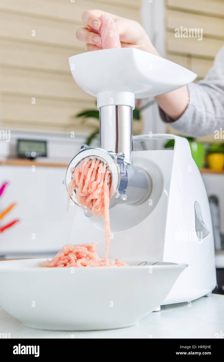 Grinder with minced meat in modern kitchen Stock Photo - Alamy
