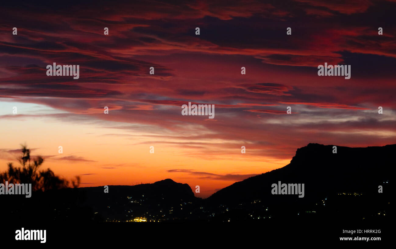 Sunset over Calpe Moraira, Spain Stock Photo - Alamy