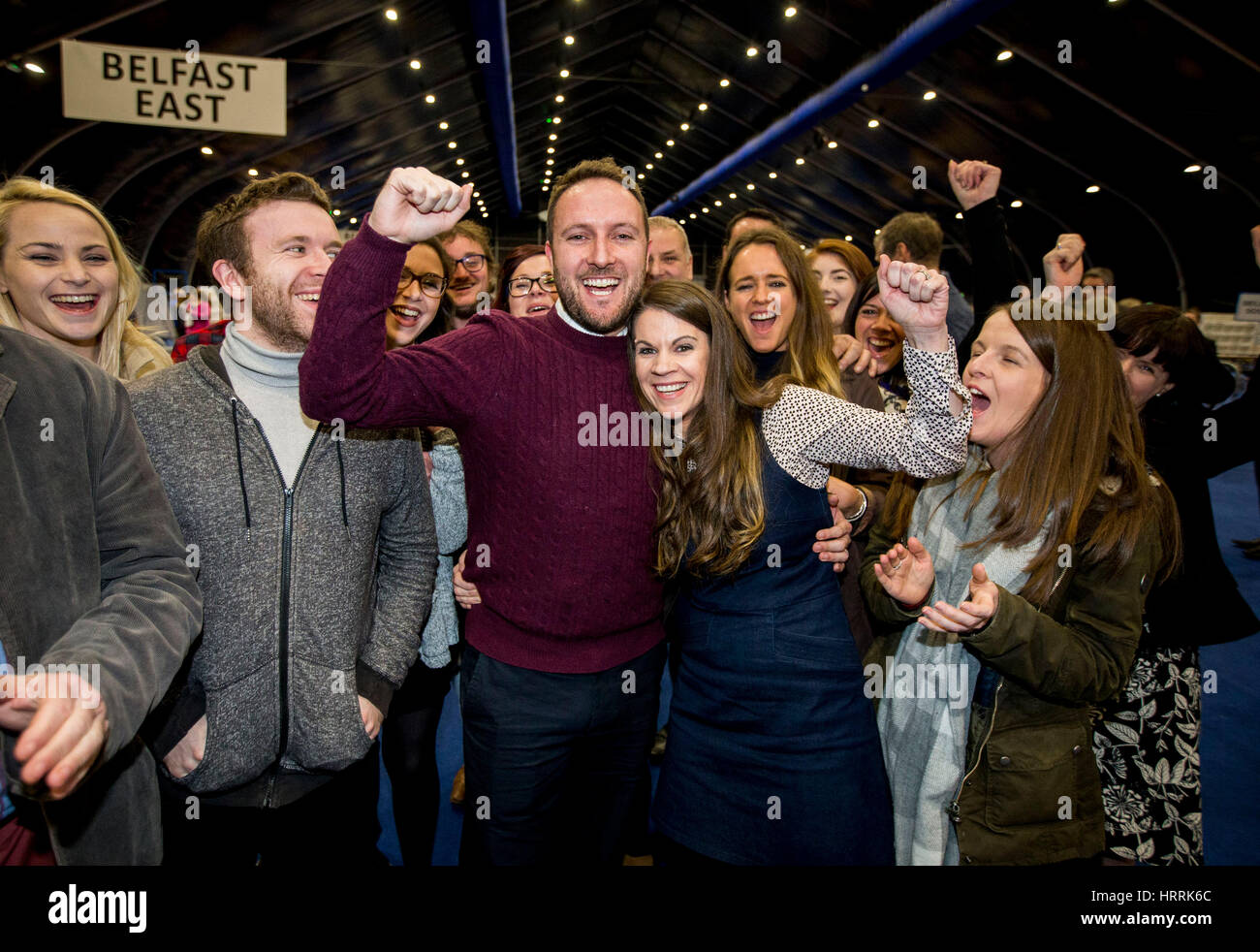 Returned Alliance Party MLA Chris Lyttle (centre) celebrates with his ...