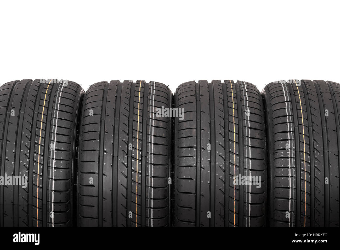 New car tires isolated on white background. Summer tyres Stock Photo ...