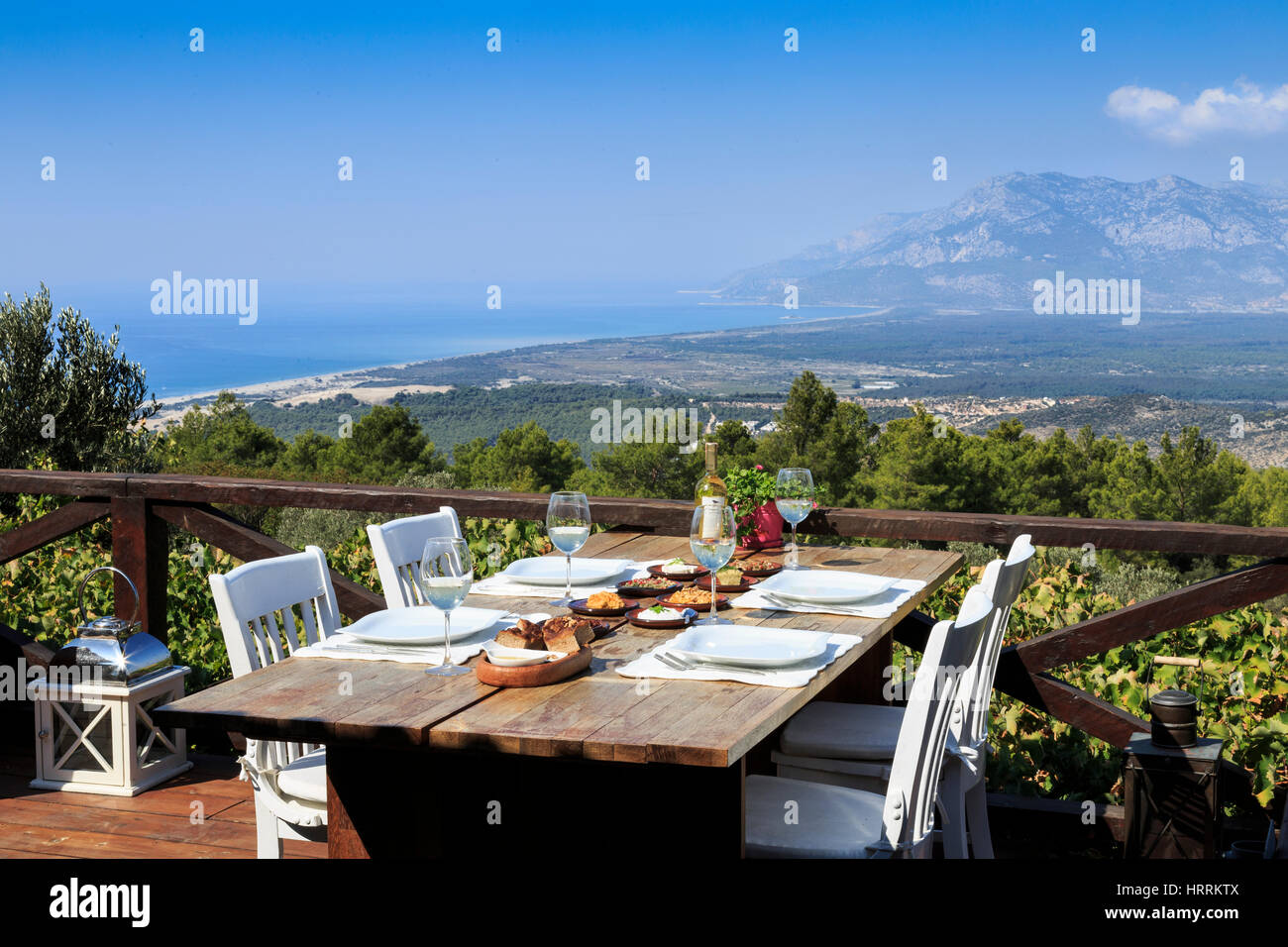 Lunchtime table with view of Patara, Turkey Stock Photo - Alamy
