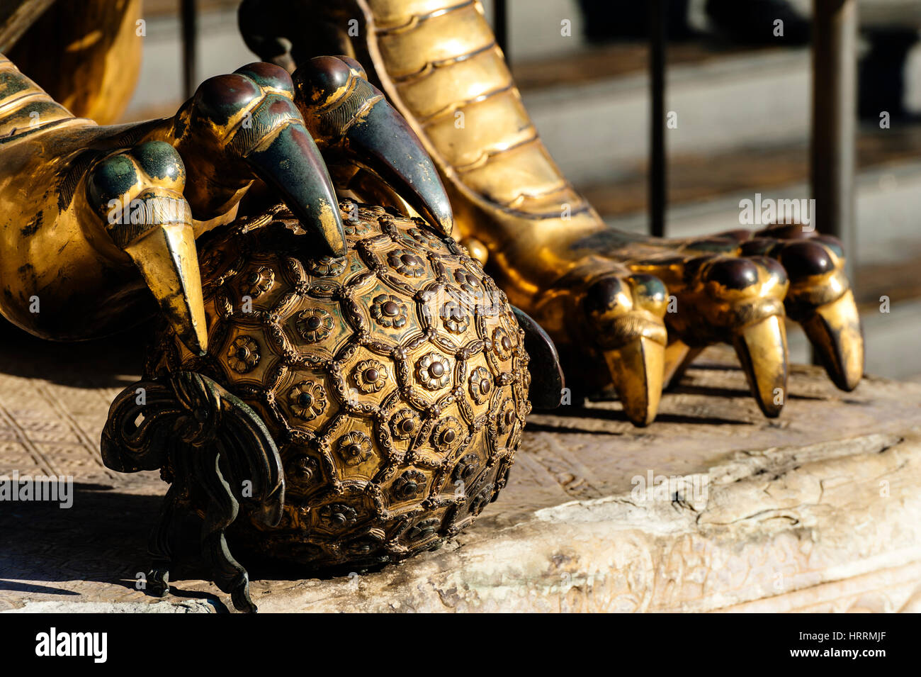 The bronze hydrangea under claws of lion sculpture, Forbidden City ...