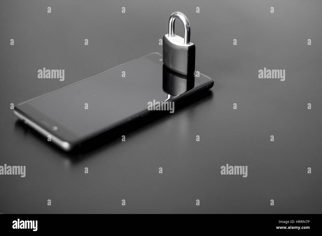 Smartphone security concept , with padlock on top Stock Photo - Alamy