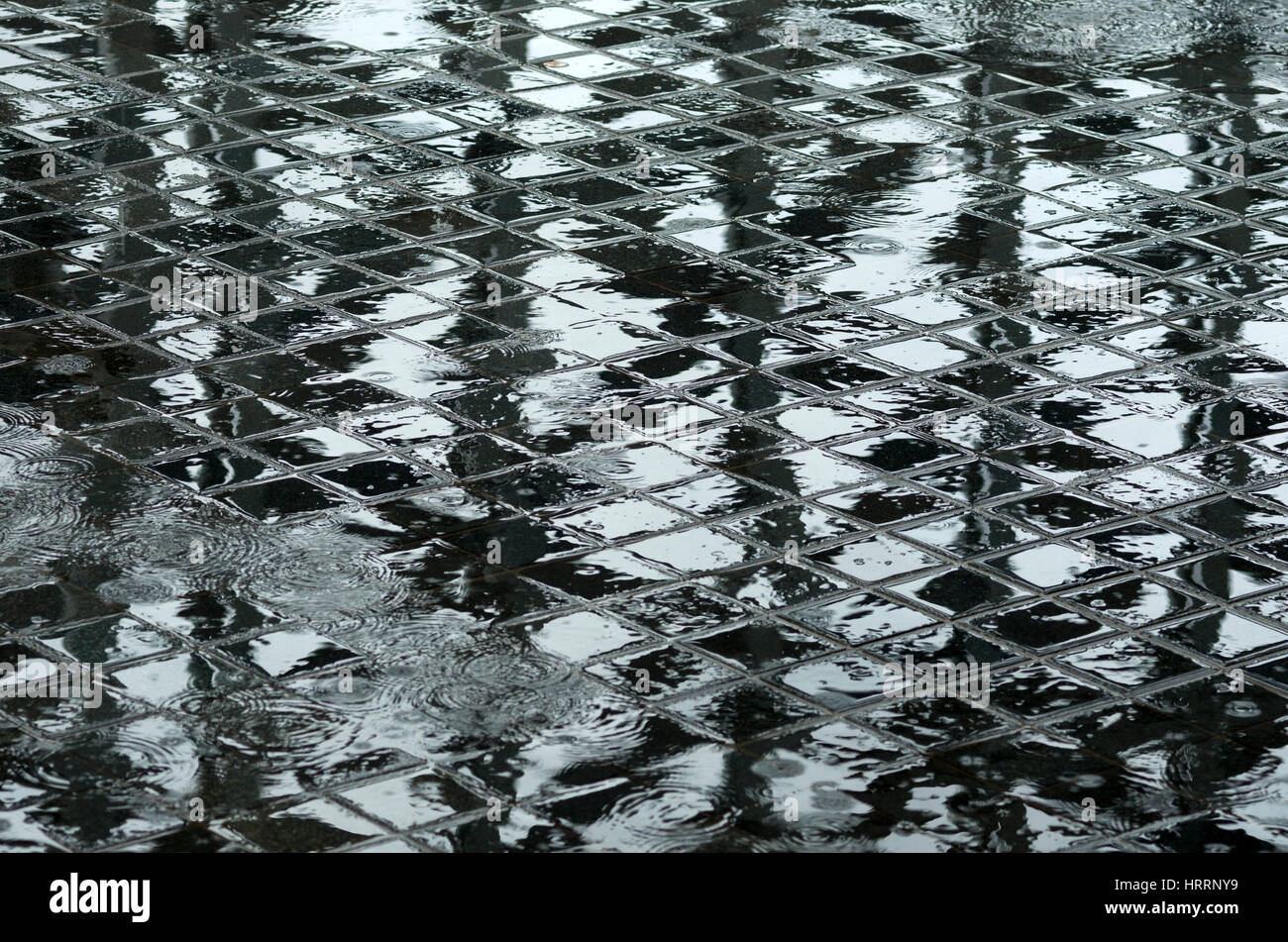Rain drop on pavement Stock Photo - Alamy