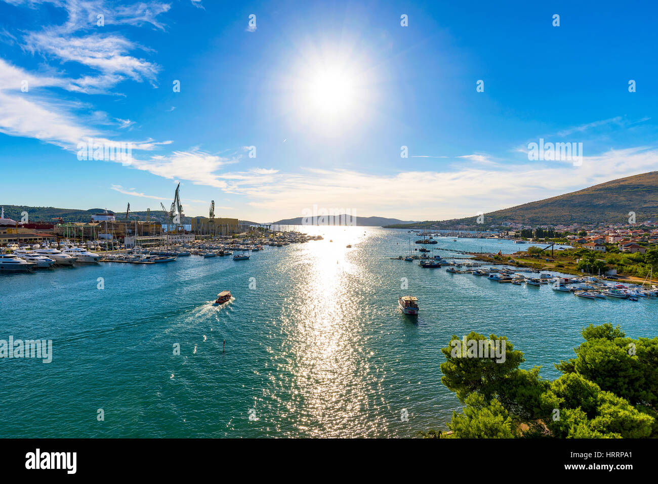 Waterfront of Trogir with sunlight Stock Photo - Alamy