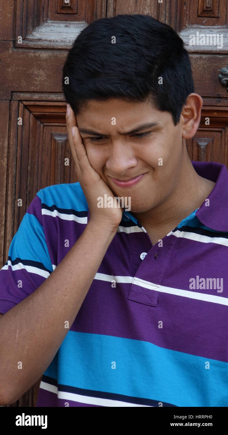 Teen Boy Toothache Or Forgetful Stock Photo - Alamy
