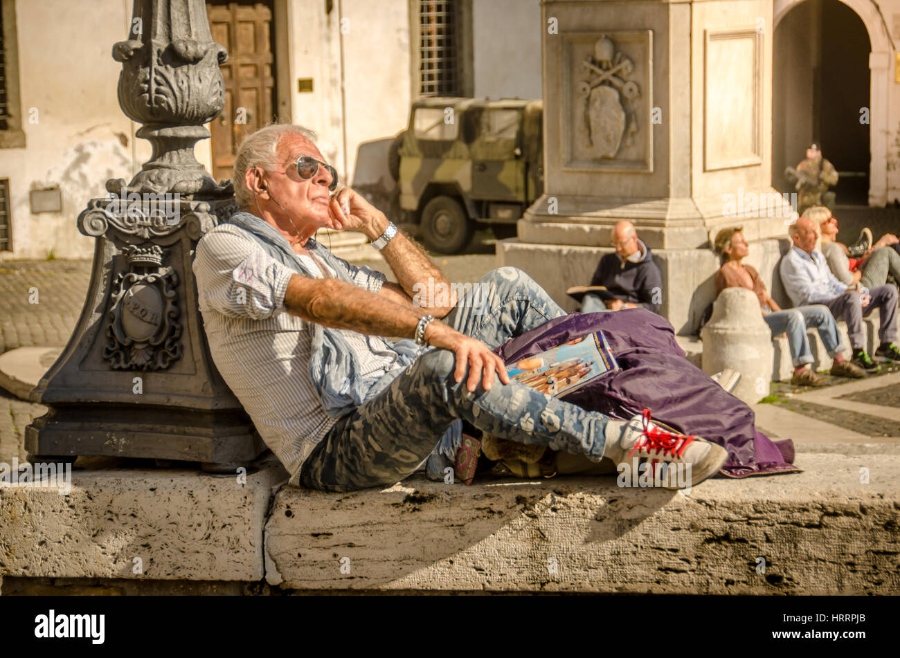 Man relaxing in the sun Stock Photo - Alamy
