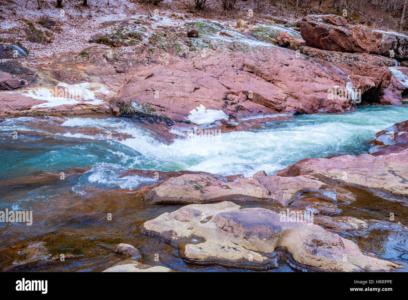 Beautiful winter landscape with turquoise mountain river and granite ...