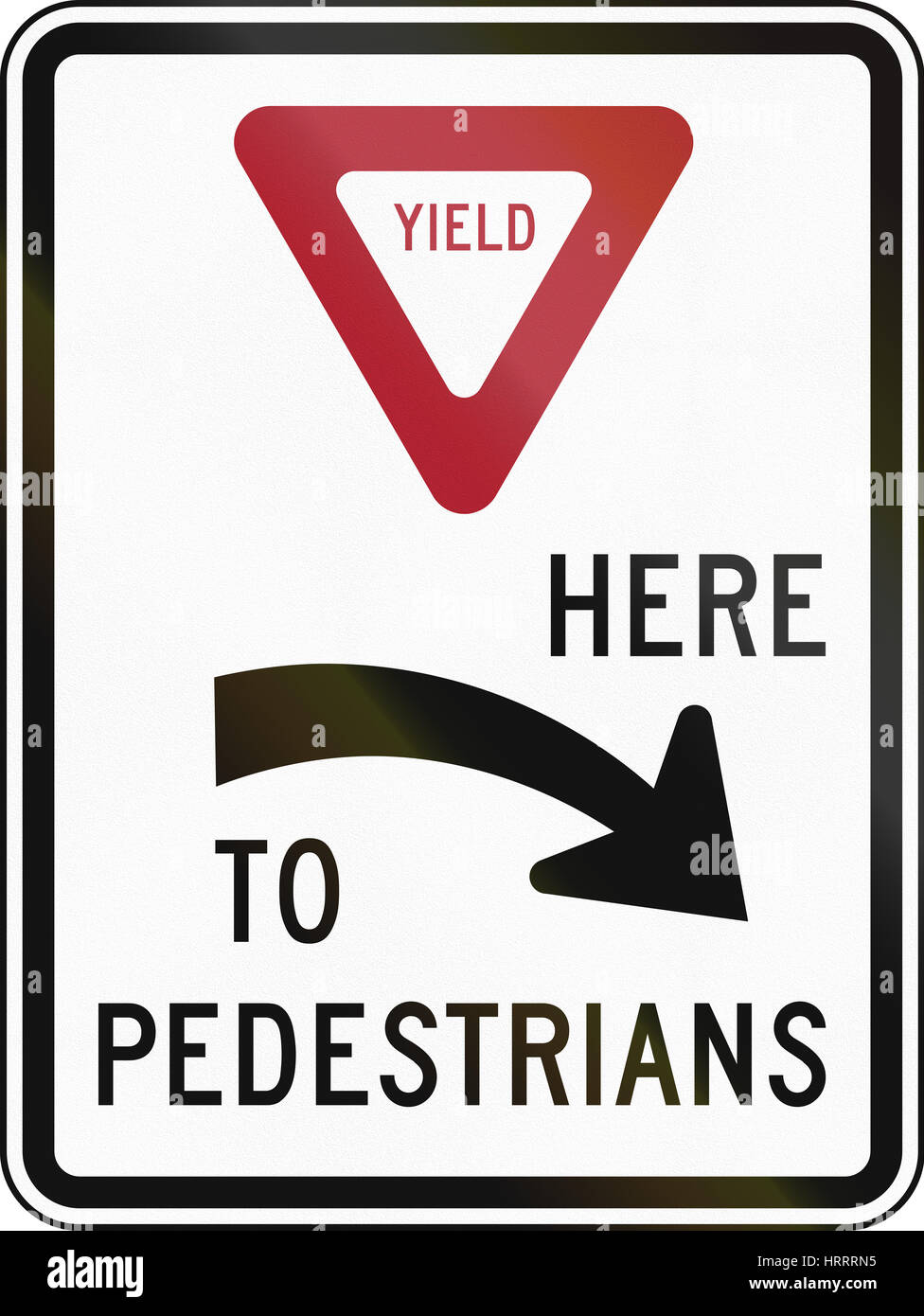 United States MUTCD regulatory road sign - Yield here to pedestrians ...