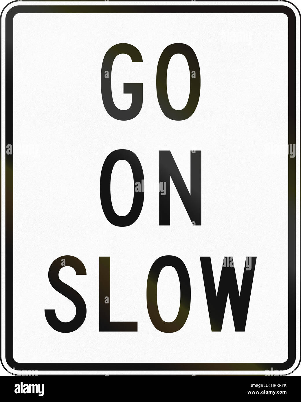 United States MUTCD road sign - Go on slow Stock Photo - Alamy