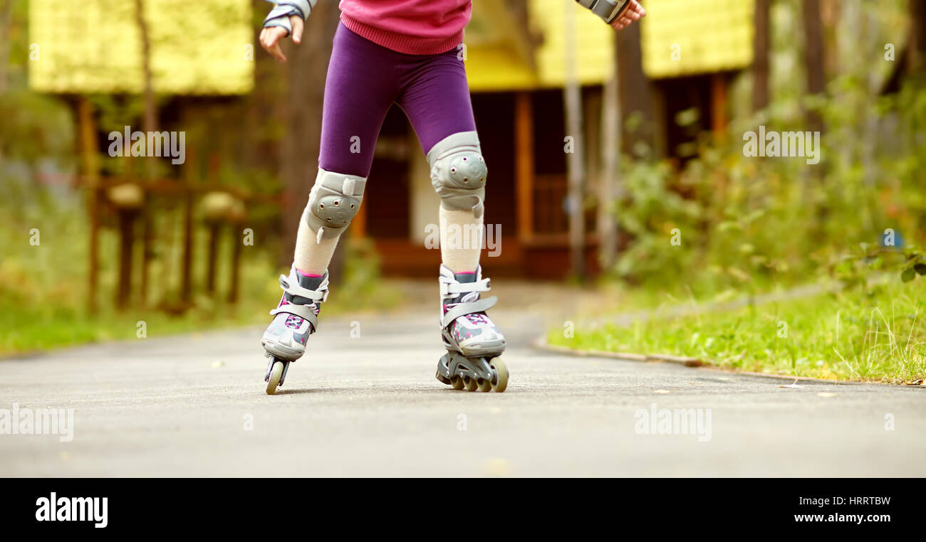child rollerblading outdoors. sport lifestyle. roller skating Stock ...