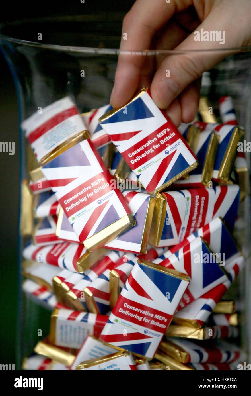 A delegate takes a chocolate from a stall at the annual Scottish ...