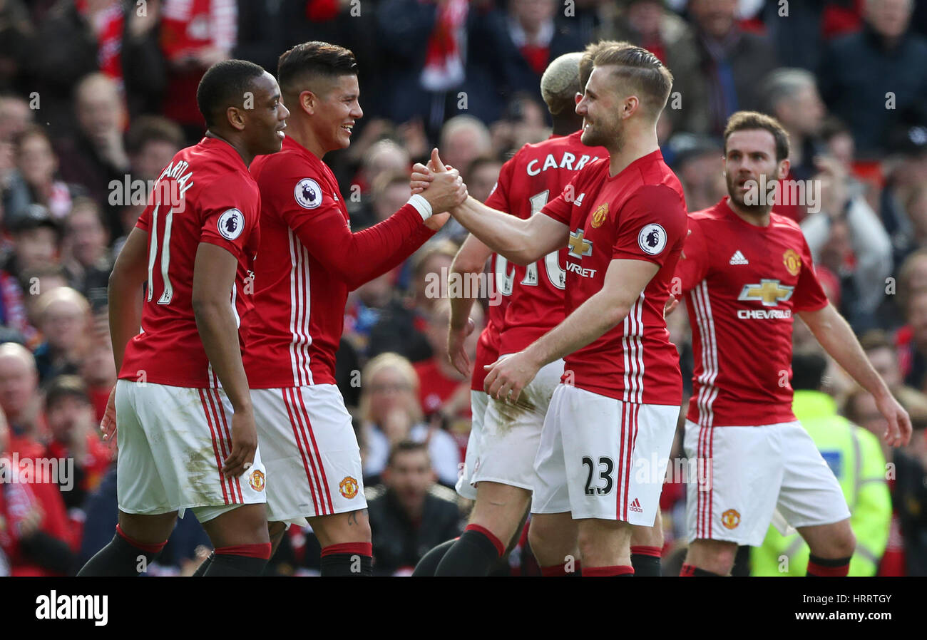 Manchester United's Marcos Rojo (left) celebrates with team-mate Luke ...