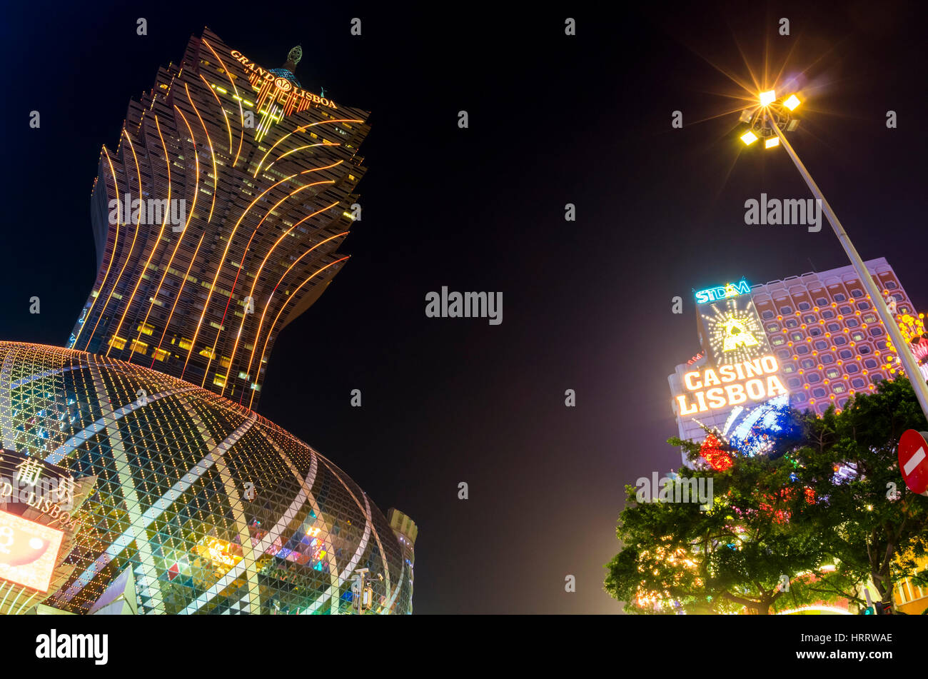 Entertainment district at night Stock Photo - Alamy