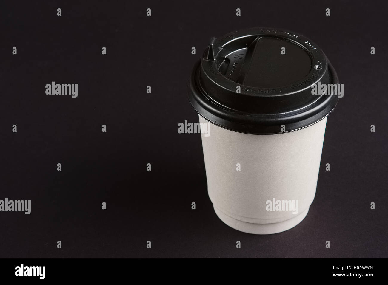 Cardboard cup with lid. Place for text Stock Photo - Alamy