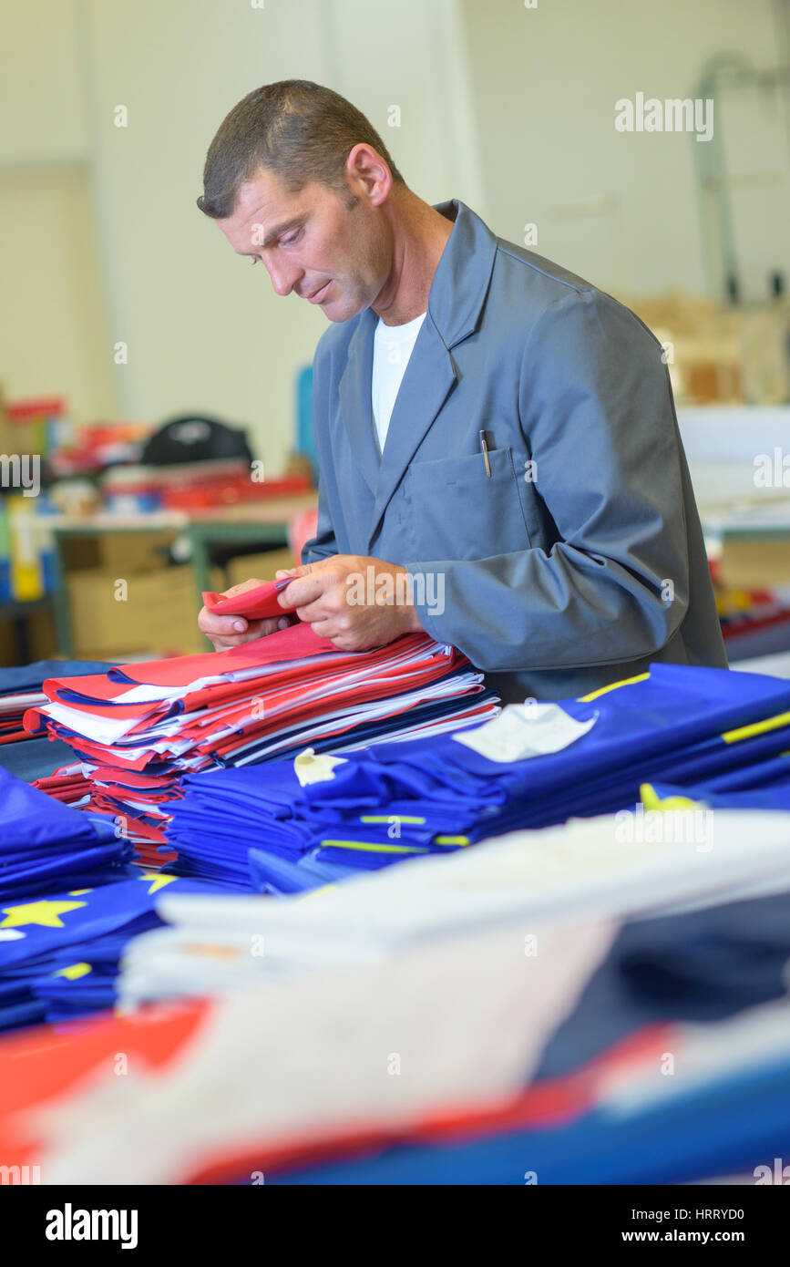 checking the fabric Stock Photo - Alamy