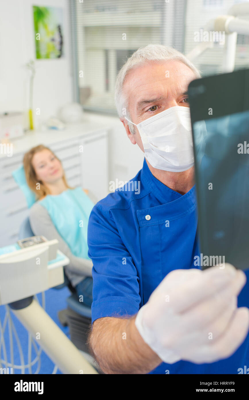 senior dentist with a patients x-ray Stock Photo - Alamy