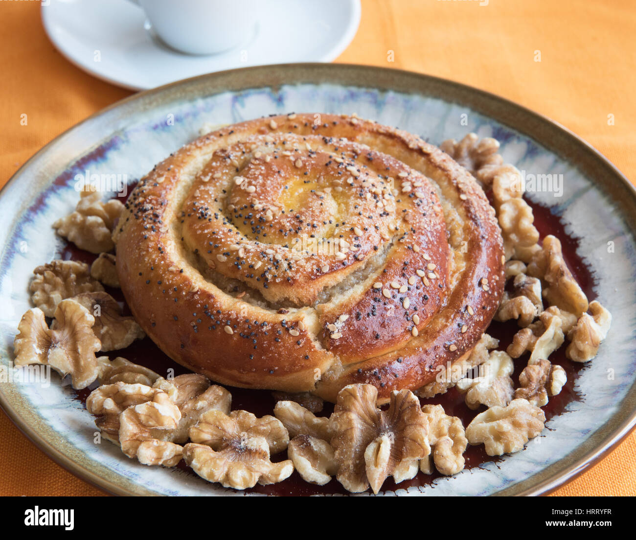 pastry with baked walnuts with a cup of coffeewalnuts Stock Photo - Alamy