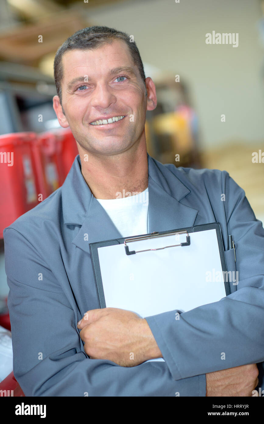 man holding a folder Stock Photo - Alamy
