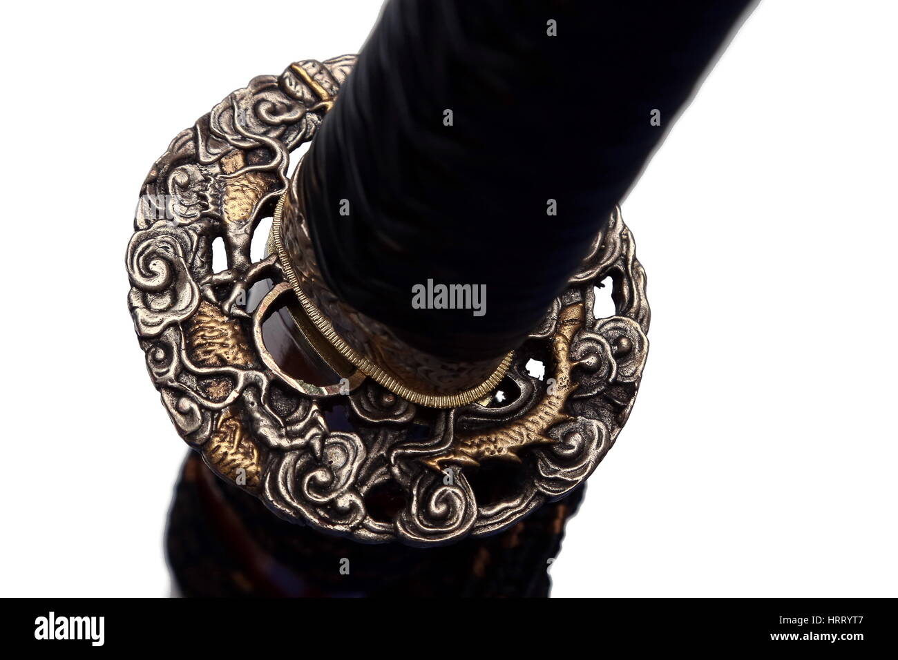 Tsuba : hand guard of Japanese sword with white background Stock Photo ...