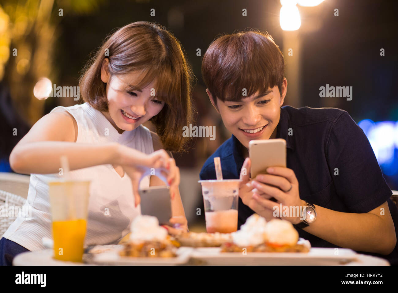 Happy young couple dating Stock Photo - Alamy