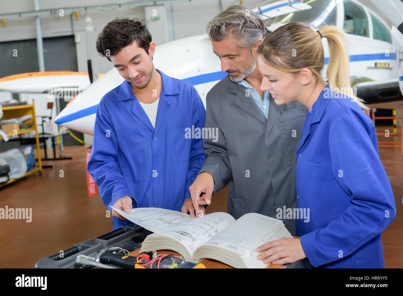 reading the guide Stock Photo - Alamy