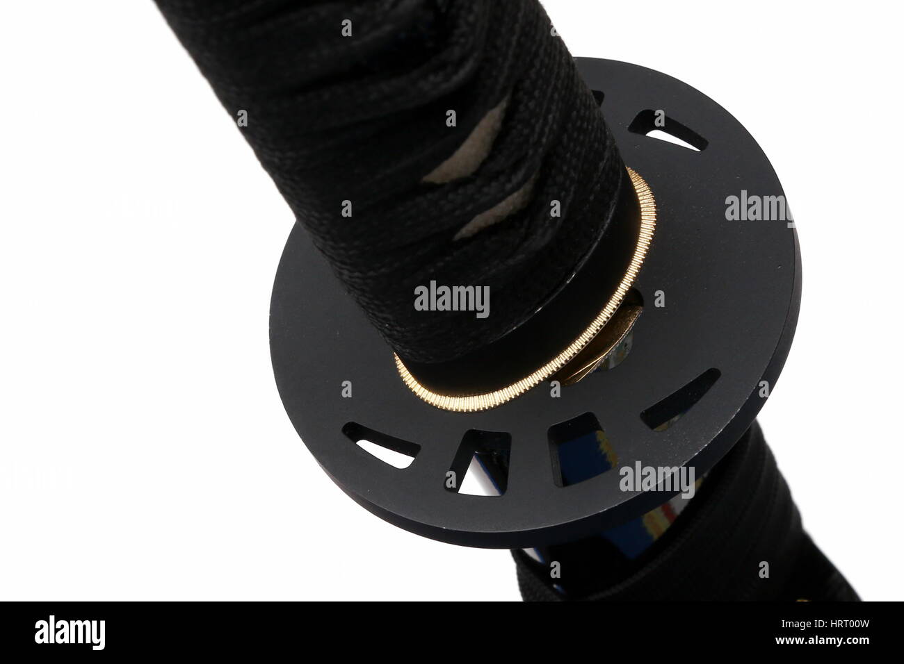 Tsuba : hand guard of Japanese sword with white background Stock Photo ...