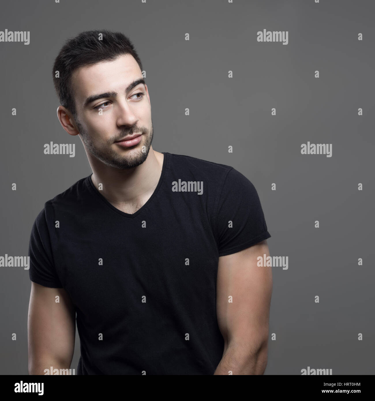 Man looking over shoulder dark hi-res stock photography and images - Alamy