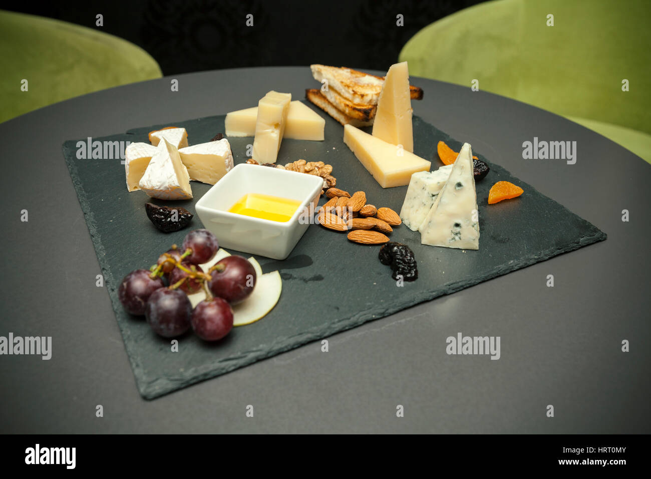 different types of cheeses with dried fruits close up Stock Photo - Alamy