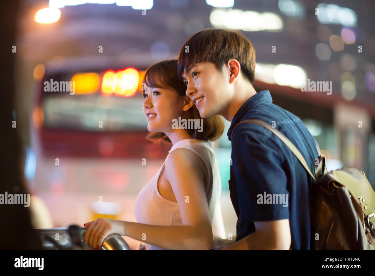 Two women waiting bus in hi-res stock photography and images - Alamy
