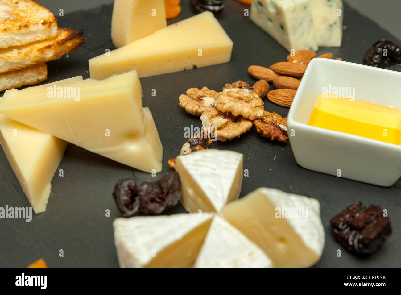 different types of cheeses with dried fruits close up Stock Photo - Alamy