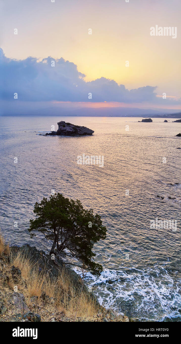 Cyprus beautiful sunrise at the sea with rocks and cloudy sky, natural ...