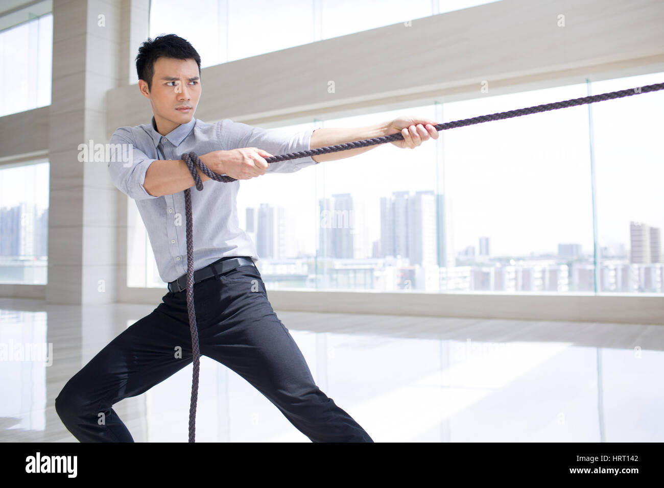 Pulling rope hi-res stock photography and images - Alamy