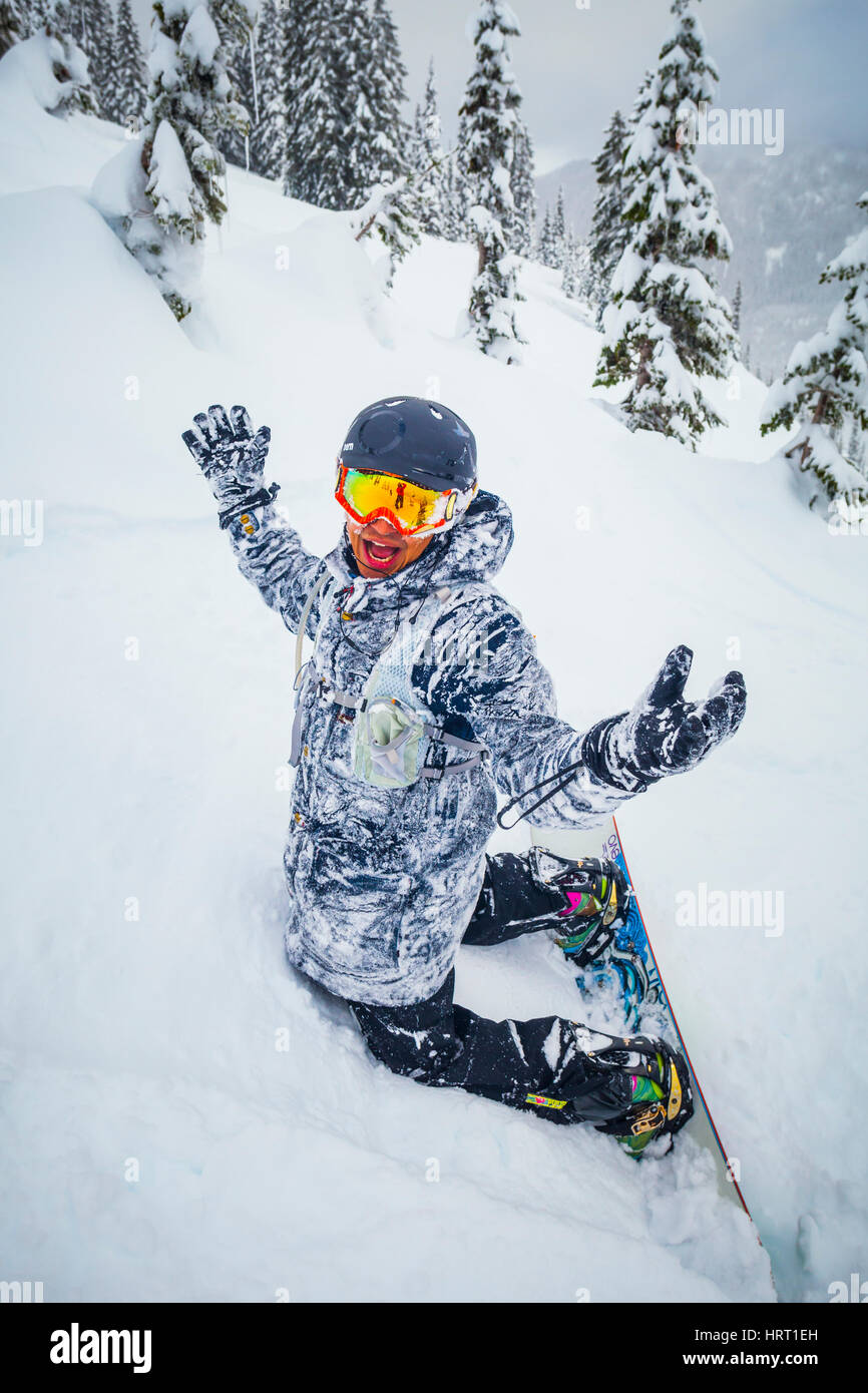 A young man expressing himself after a fall while snowboarding Stock ...