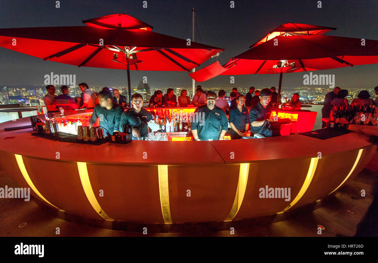 Roof top bar, CÉ LA VI SkyBar, bar, bartender, red sunshades, on the ...