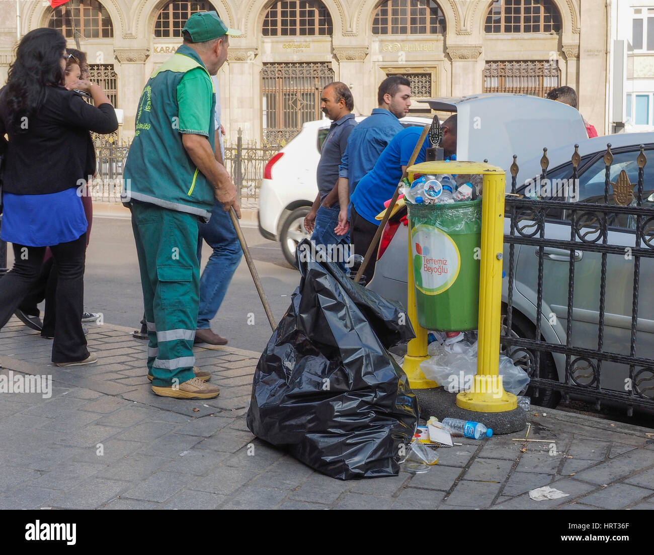 COUNCIL STREET CLEANER REMONSTRATING WITH STREET VENDORS WHO WERE ...